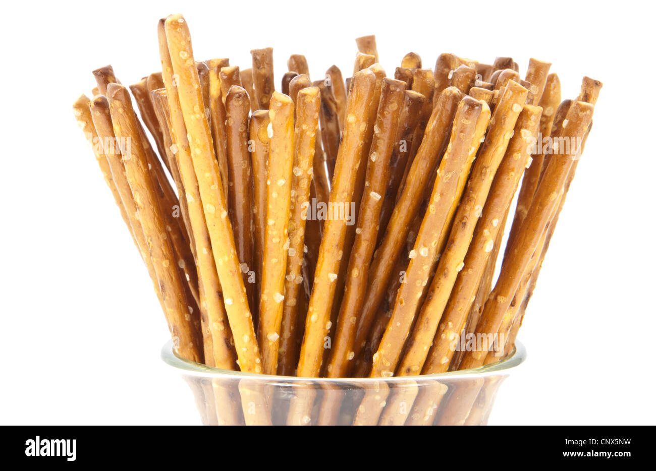 Group of salt-sticks in a glass isolated on white background (with ...