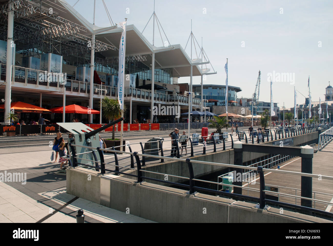 Boats moored at Gunwharf Quays marina at the entrance to the historic ...