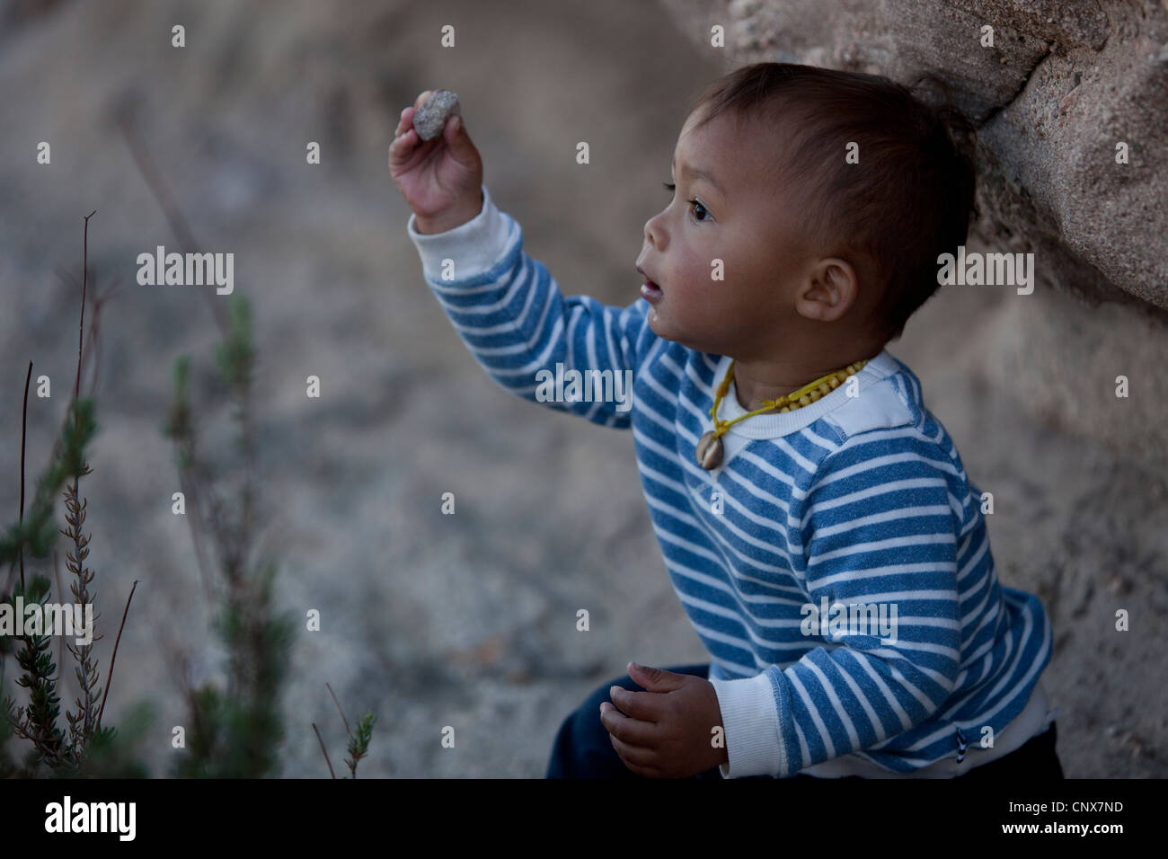 A child discovering rocks in the canyon Stock Photo - Alamy