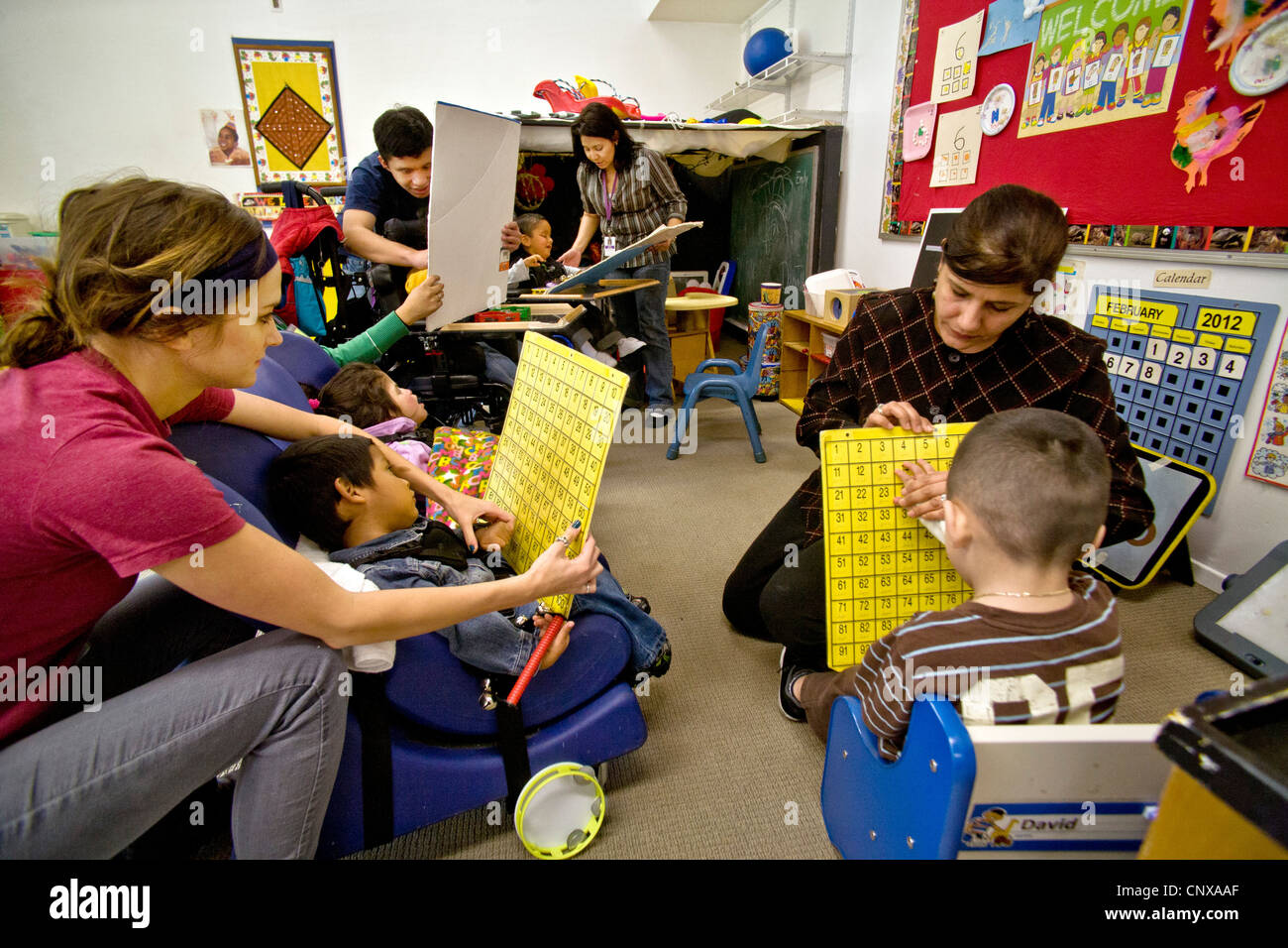 Children reading classroom wheelchair hi-res stock photography and ...