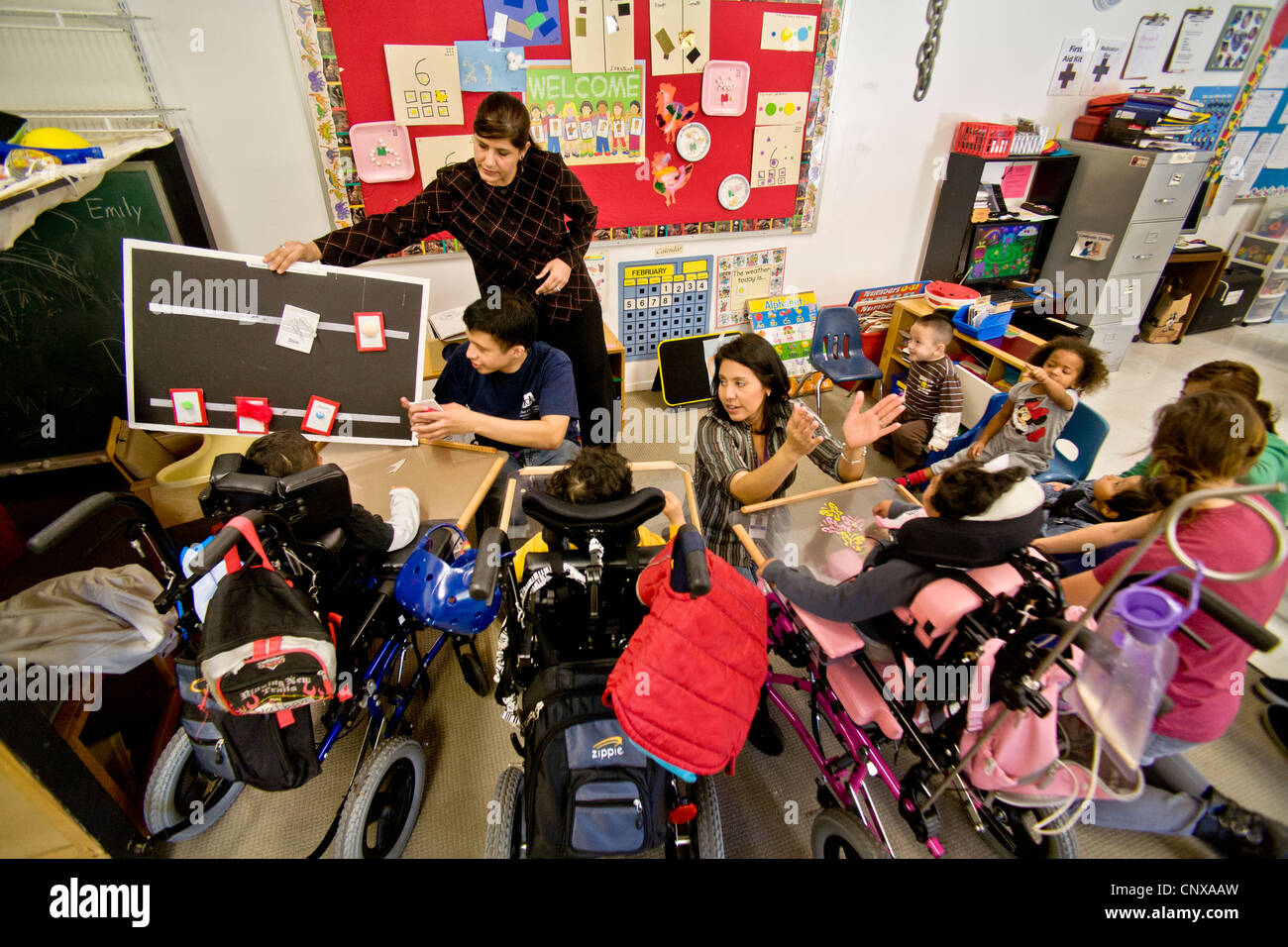 Children reading classroom wheelchair hi-res stock photography and ...