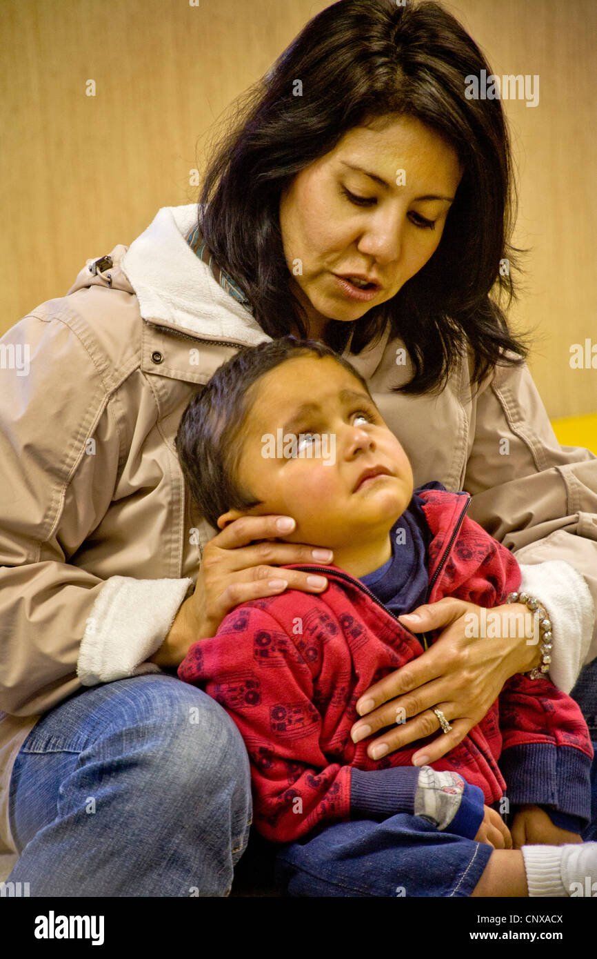 Kid crying teacher hi-res stock photography and images - Alamy