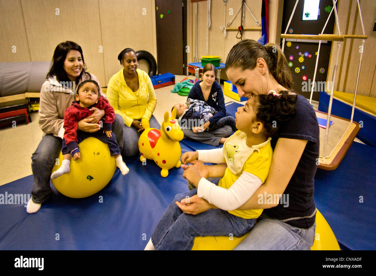 Teachers comfort disoriented vision-impaired children in a sensory ...