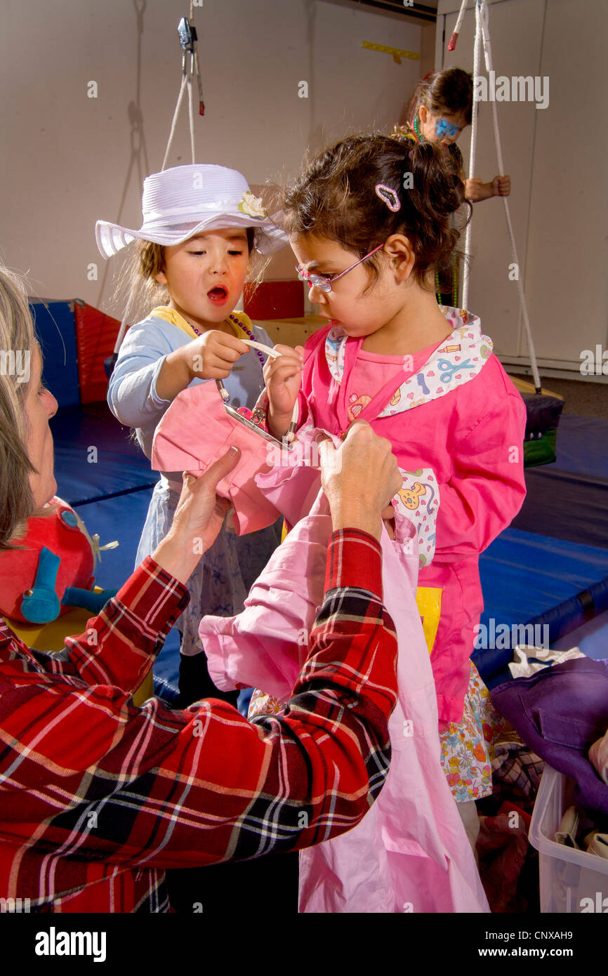 Partially blind girls don costumes for dress-up during an occupational ...