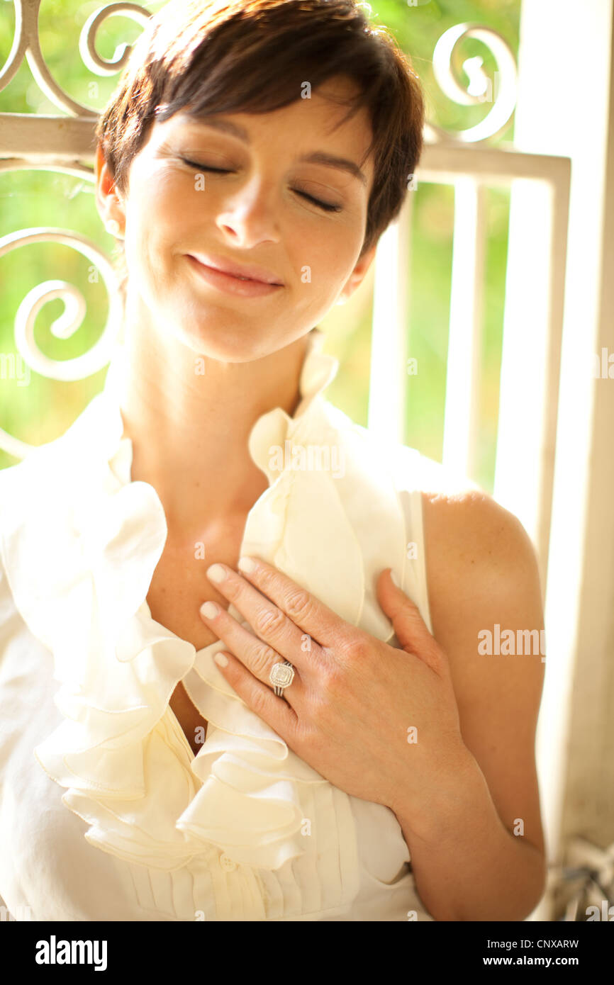 A woman feeling romantic after getting engaged Stock Photo - Alamy