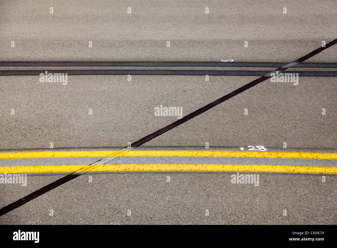 Lines on an airplane runway Stock Photo - Alamy