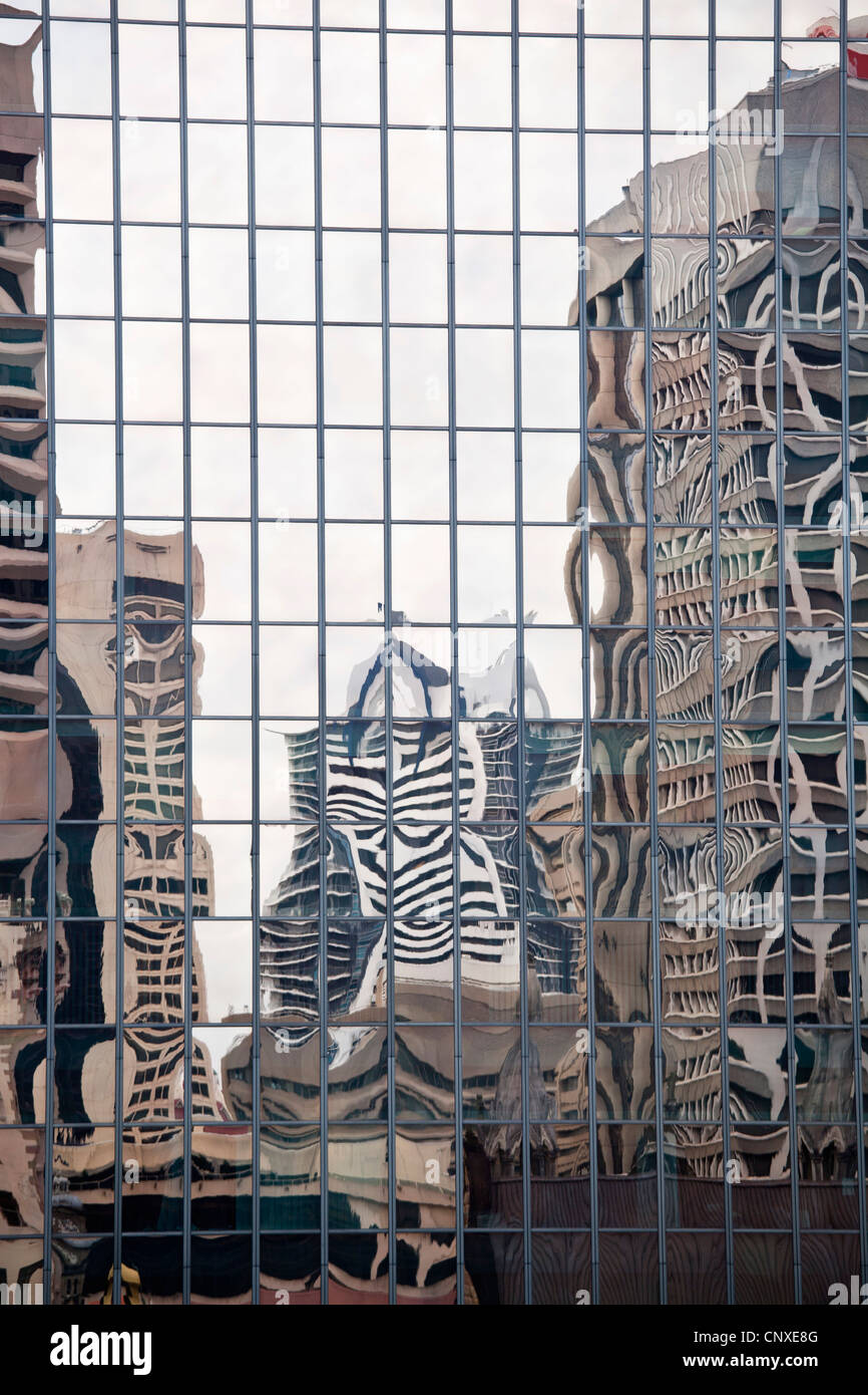 Buildings reflected in mirrored windows of office building, Brisbane ...