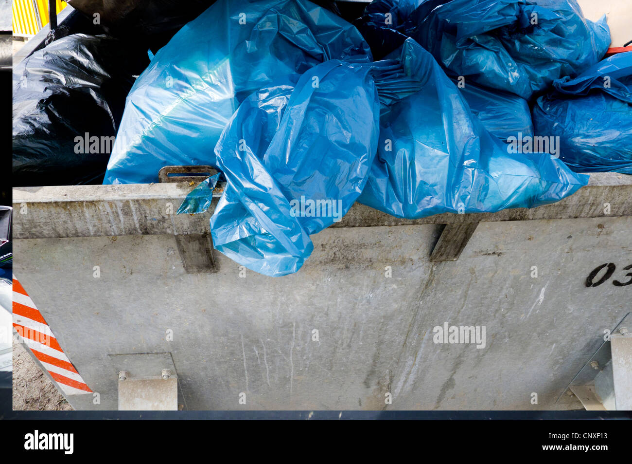 garbage in a waste container Stock Photo - Alamy