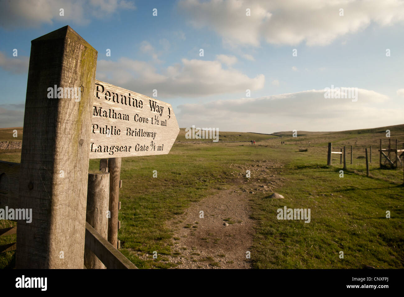 Pennie way marker post sign wood engraved Malham Cove Stock Photo - Alamy