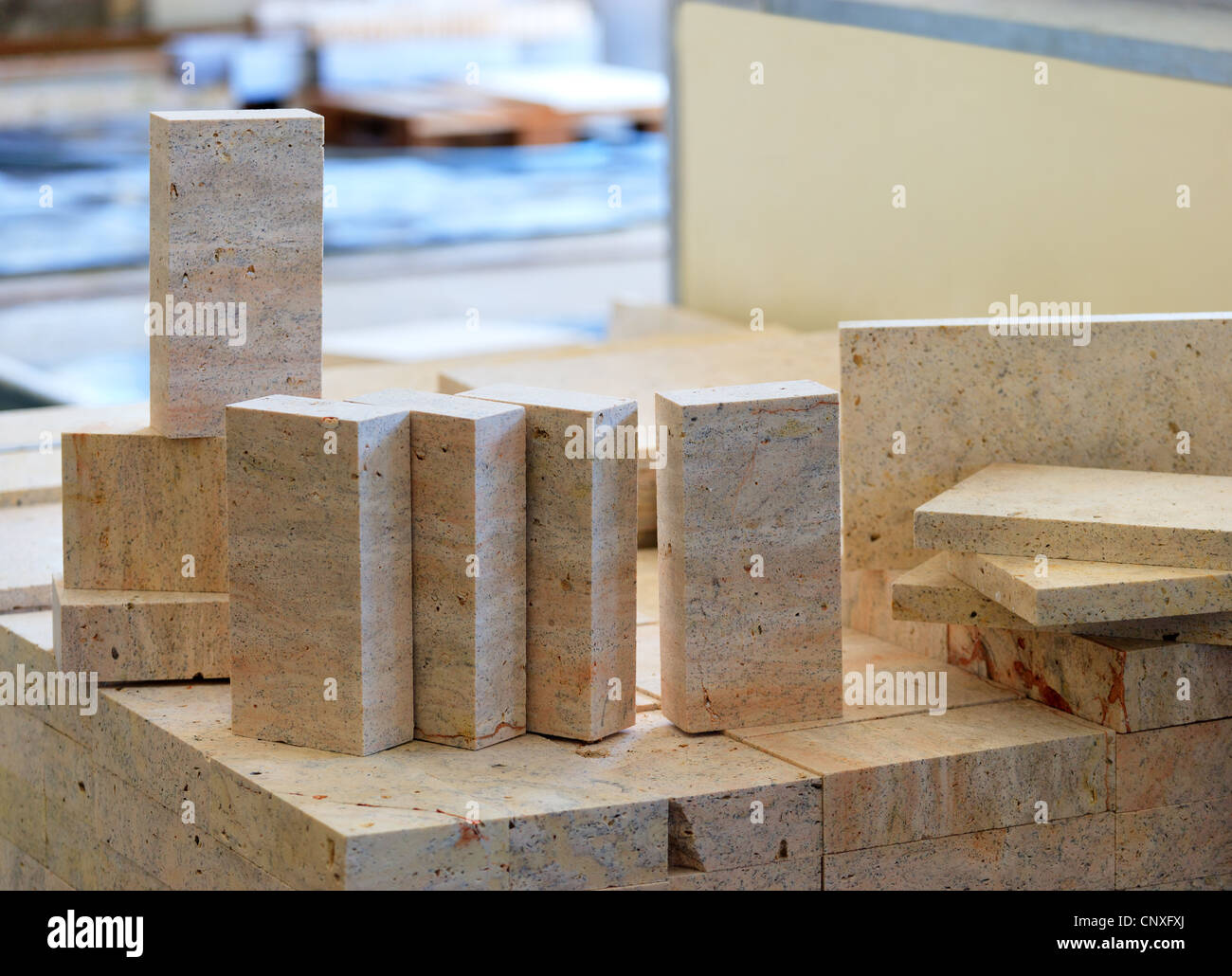 Blocks of limestone processed and ready for use, are located on the ...