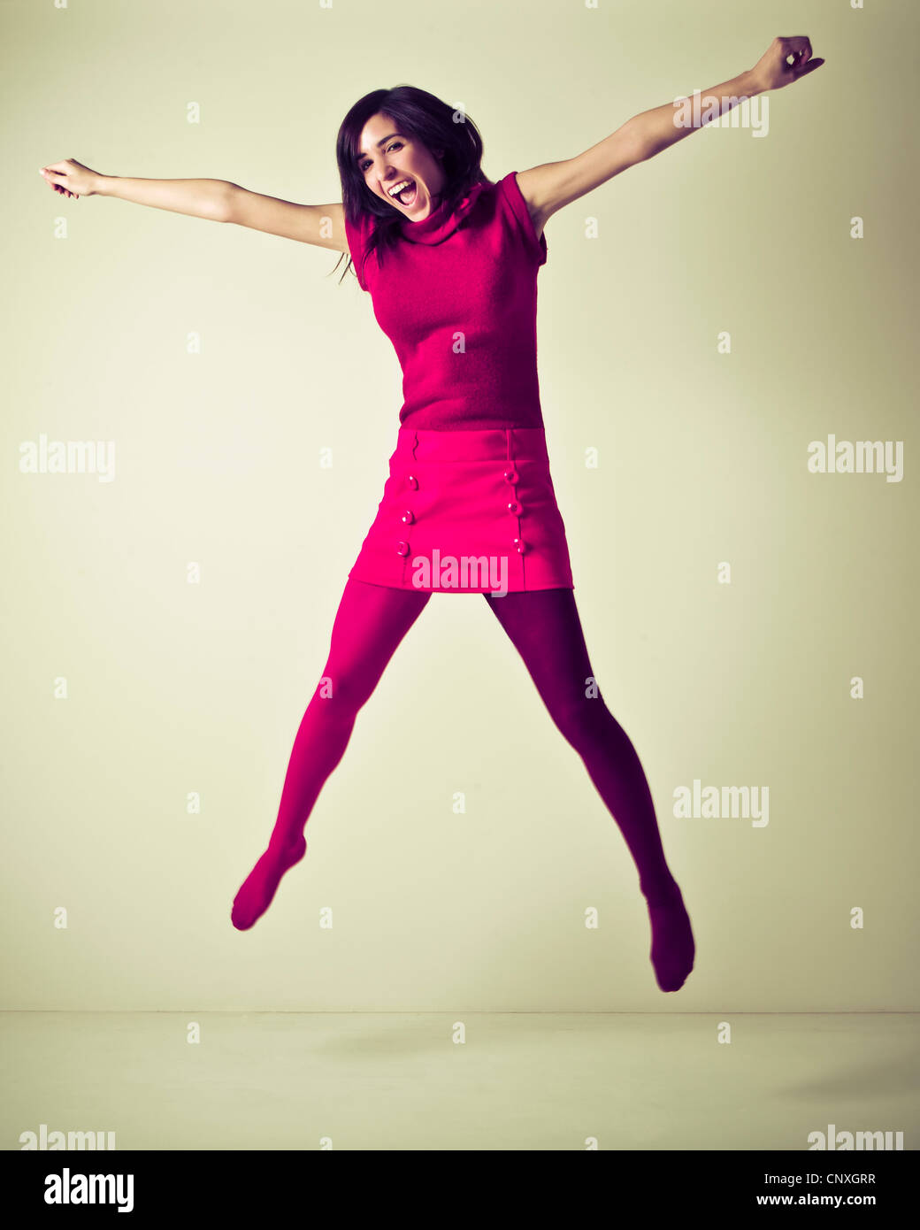 young woman jumping Stock Photo - Alamy