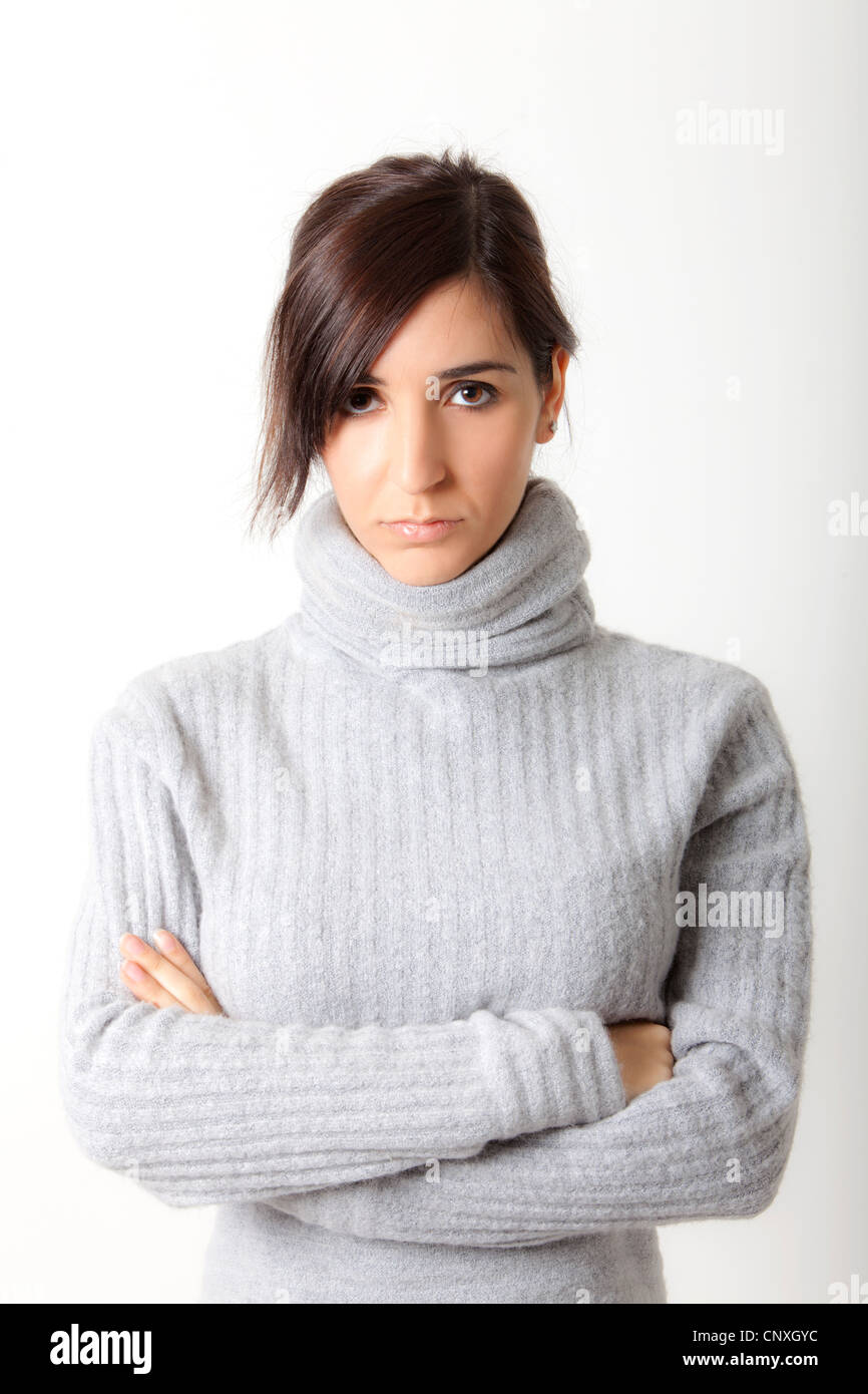 young woman with arms folded Stock Photo - Alamy