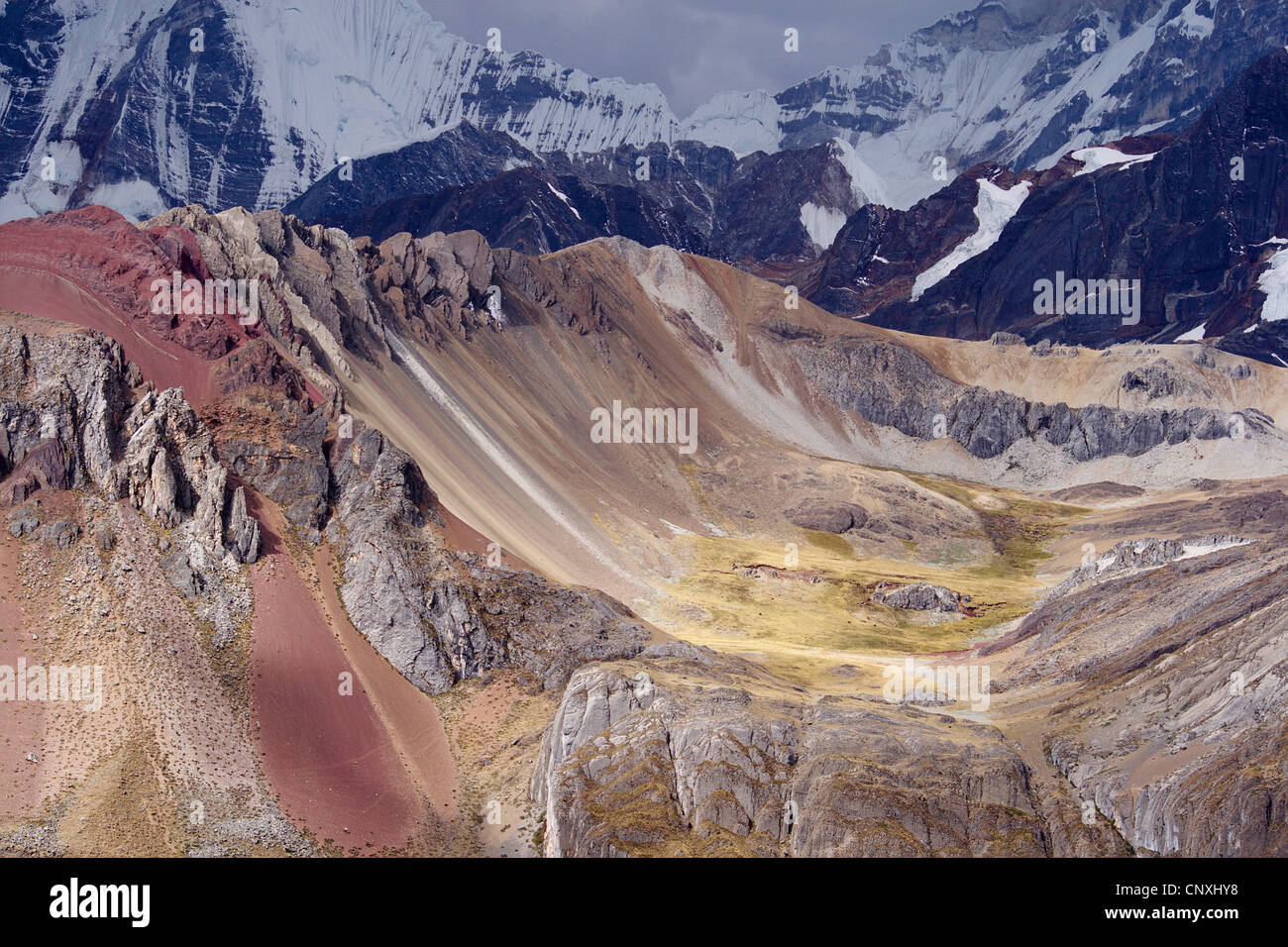 corrie in front of snowcovered mountain range in the Cordillera ...