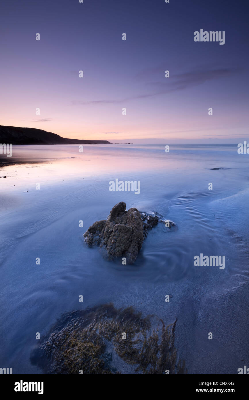 Dawn over the beach at Kennack Sands on the Lizard Peninsula, Cornwall ...