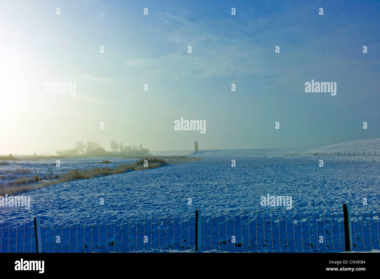 lighhouse of Pilsum in winter scenery, Germany, Lower Saxony, East ...