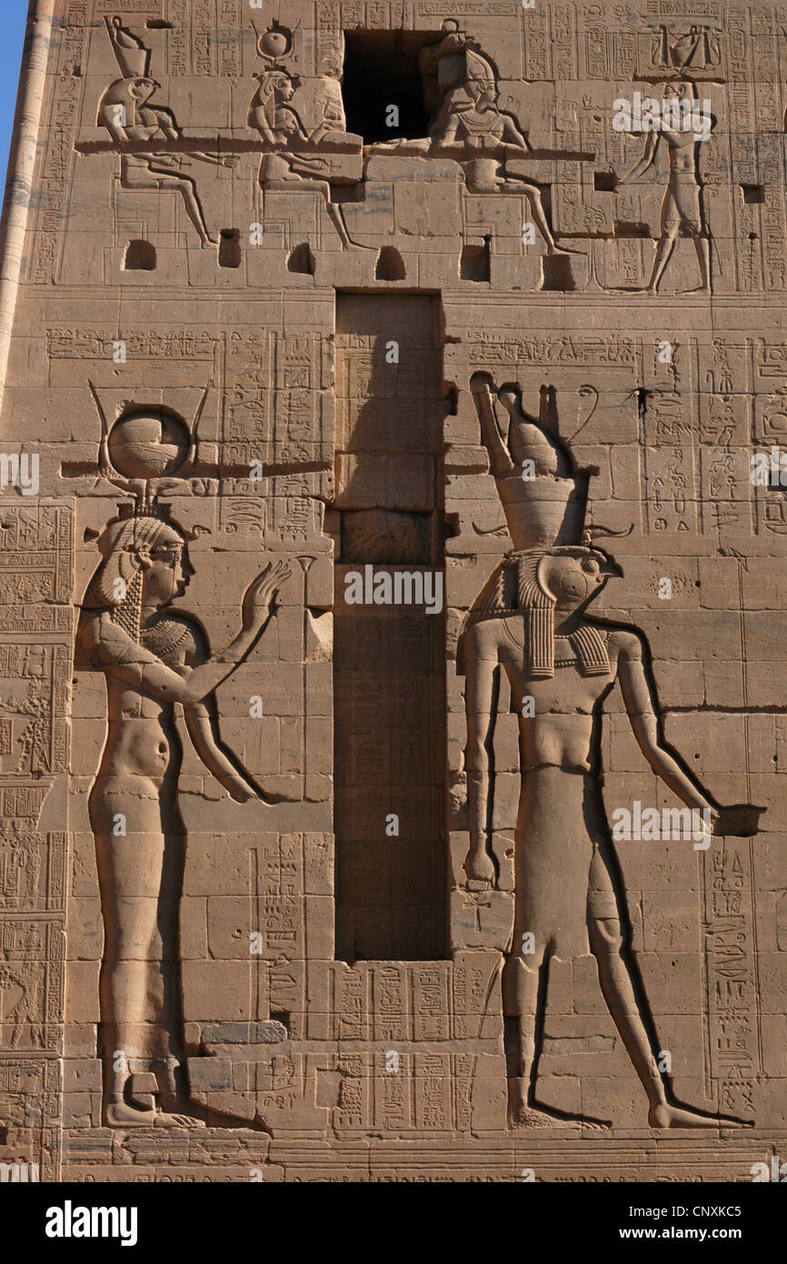 God Horus and goddess Isis. Relief on the Western colonnade of the ...