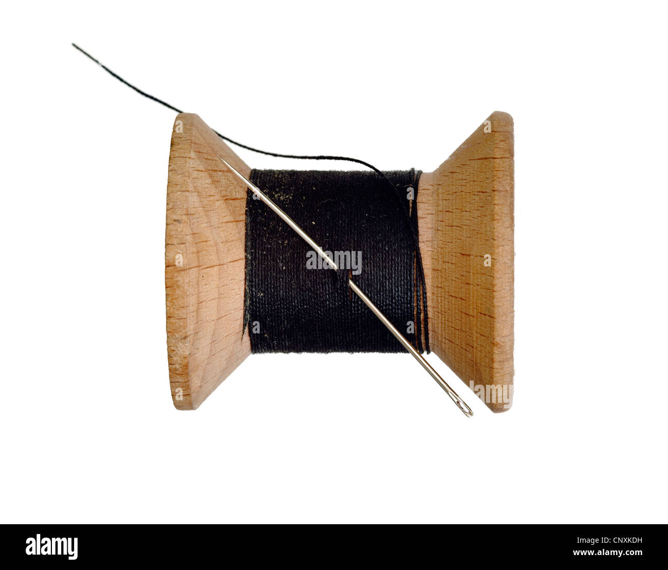 sharp needle and black thread Stock Photo - Alamy