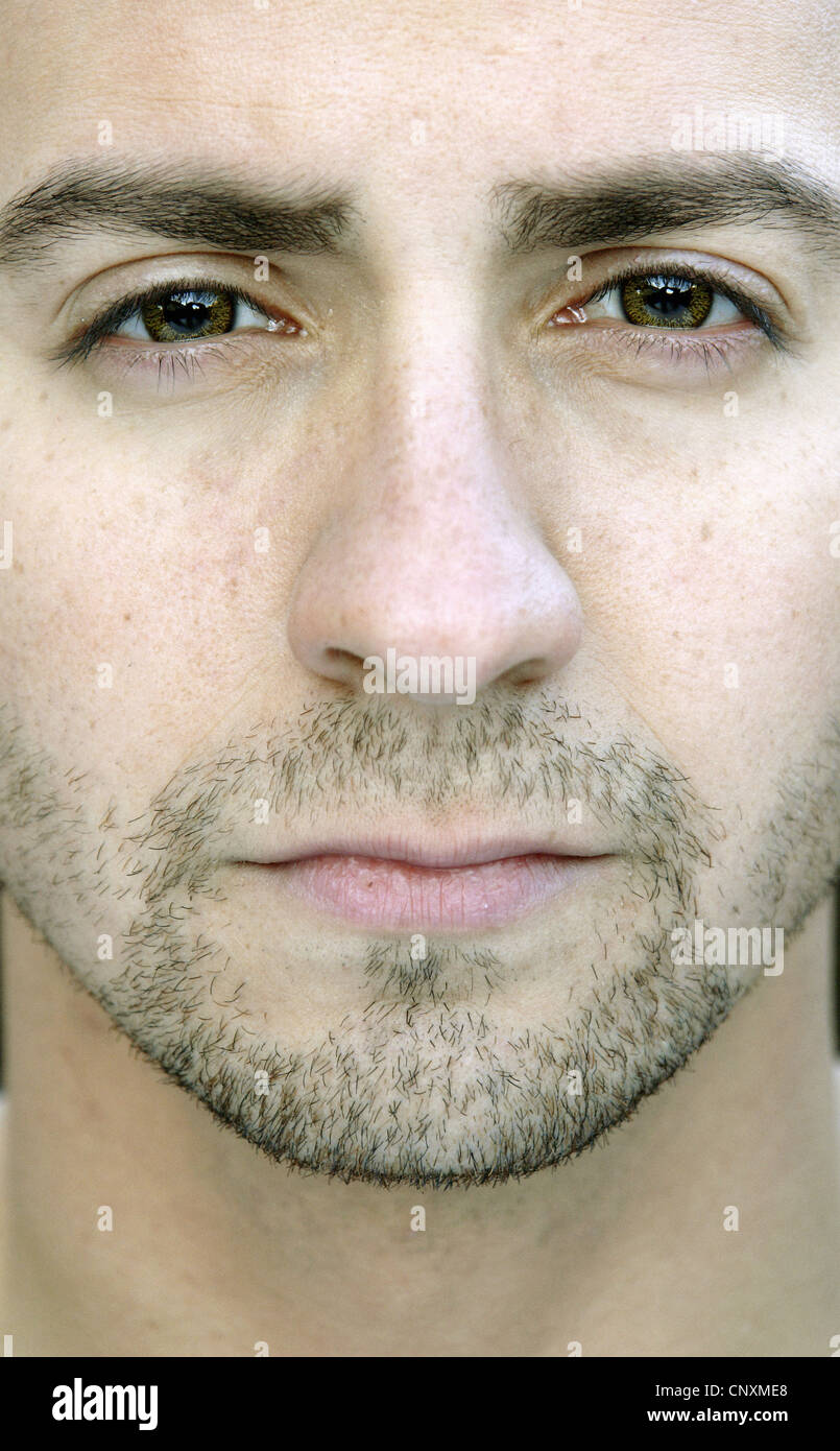 Closeup Portrait of Scruffy Unshaven Man of Hispanic Ethnicity He has a ...