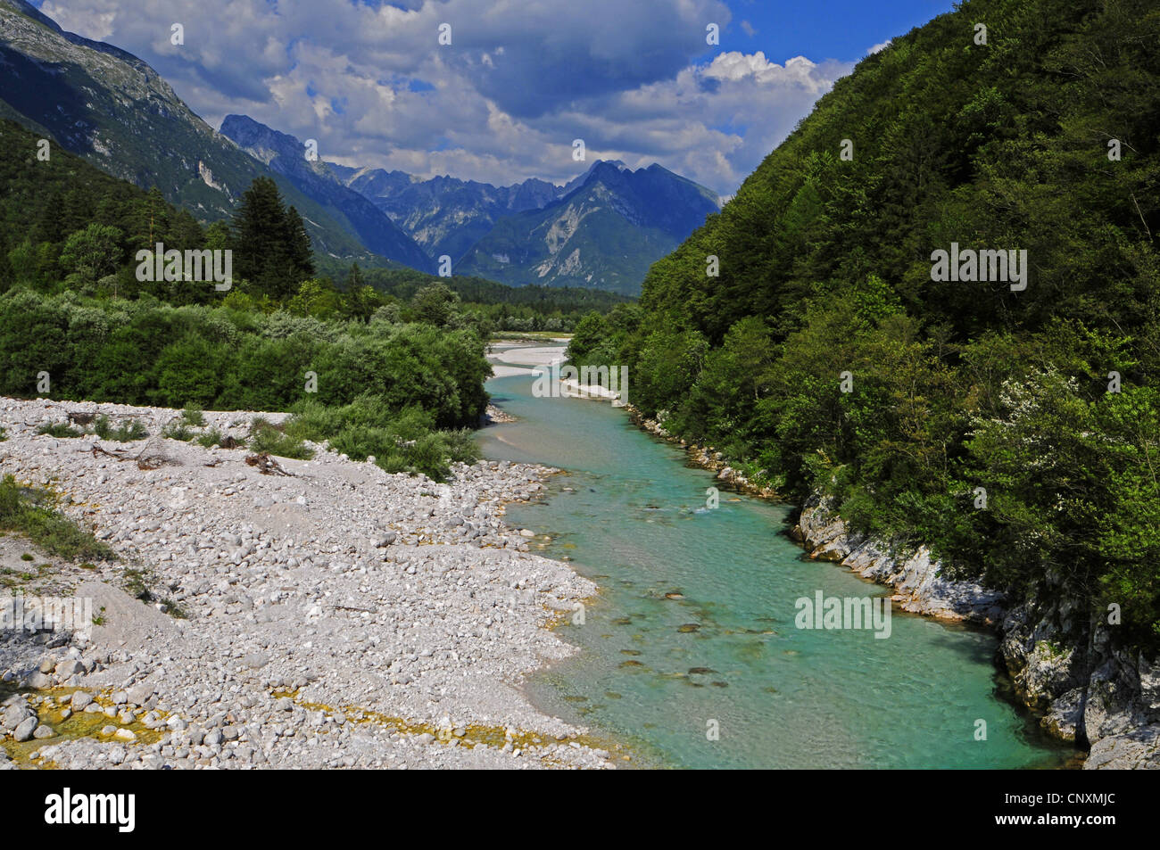 panoramic view at the valley of the Soca in front of looming mountains ...