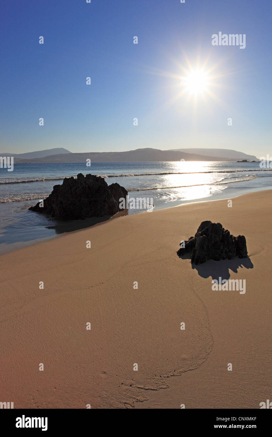 sandy beach with rock in backlight, United Kingdom, Scotland, Balnakeil ...