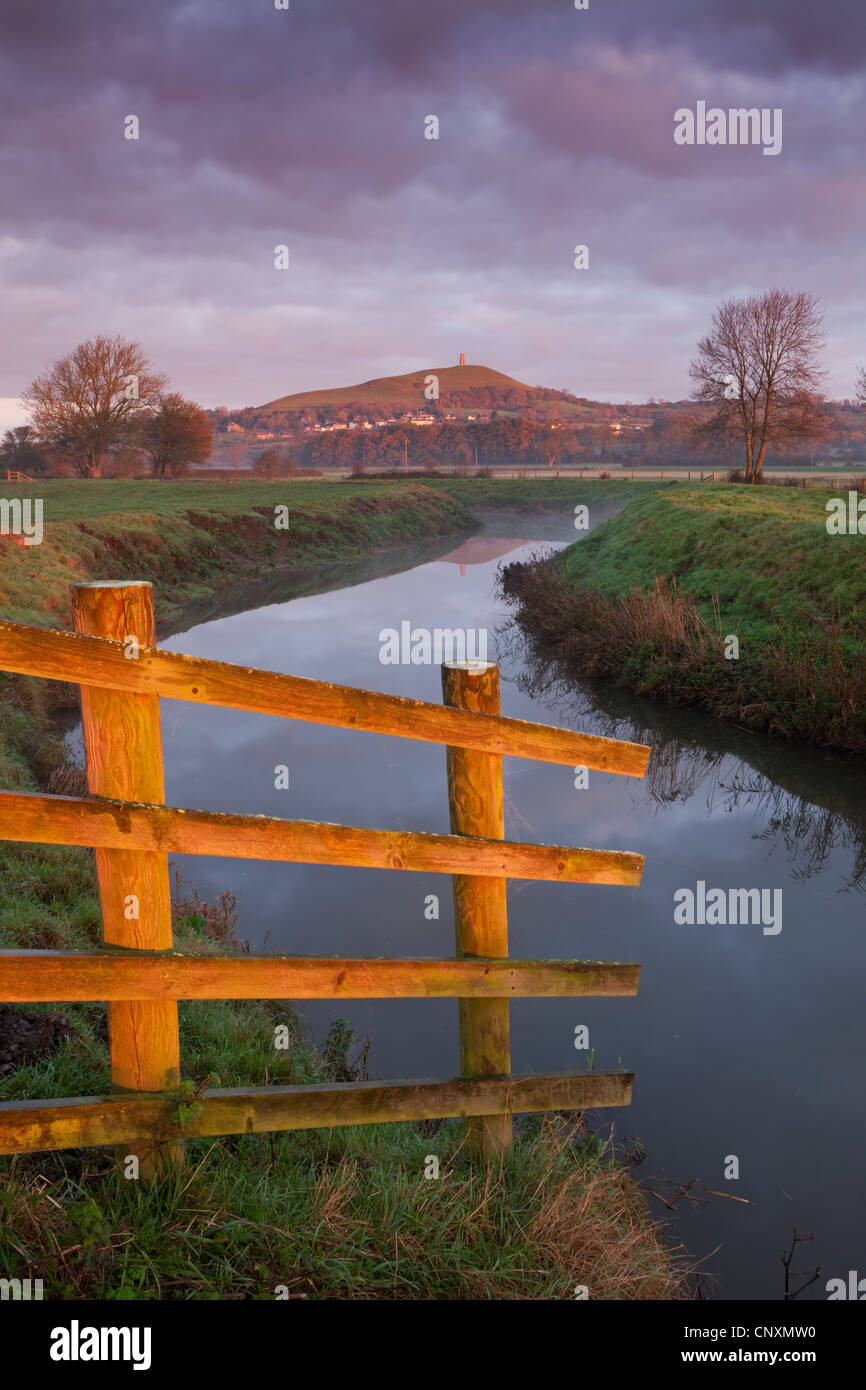 Glastonbury Tor and the River Brue at sunrise, Somerset Levels ...