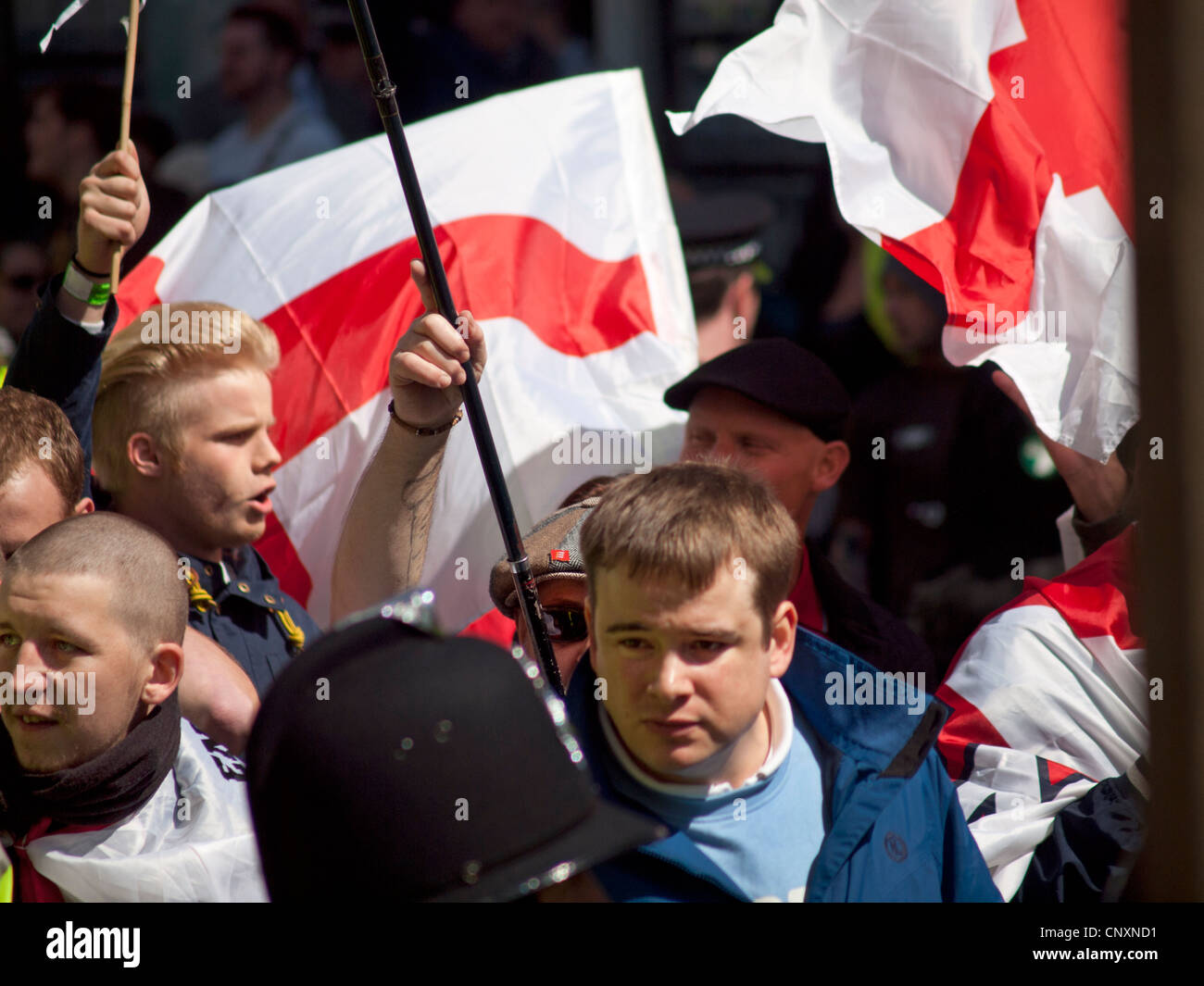 Waving flags a rally of the EDL marches through Brighton Stock Photo ...