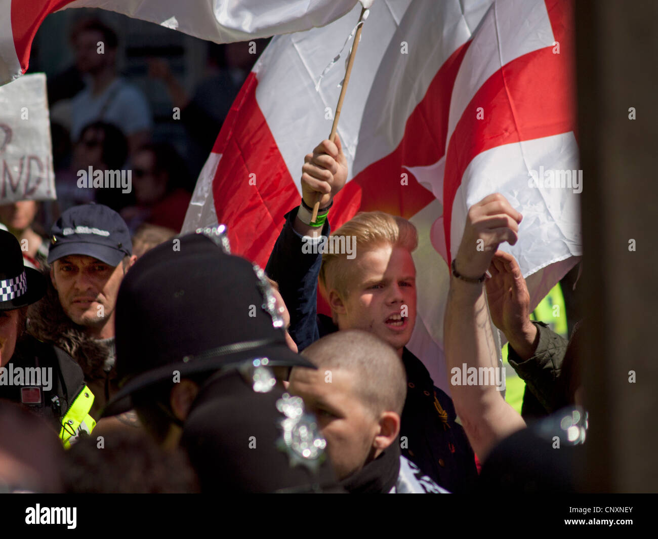 Waving flags a rally of the EDL marches through Brighton Stock Photo ...