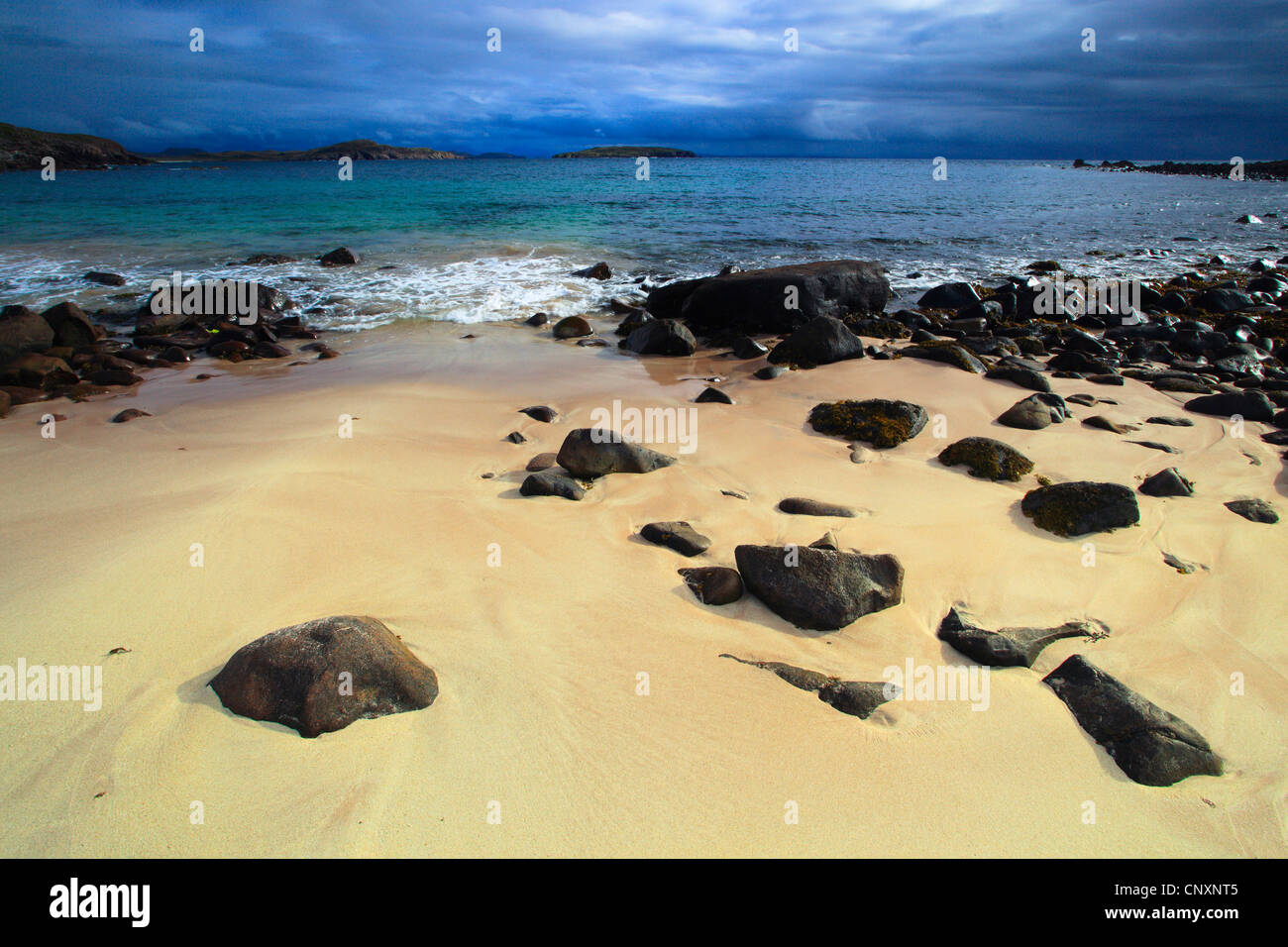 sandy beach and rocks, United Kingdom, Scotland Stock Photo - Alamy