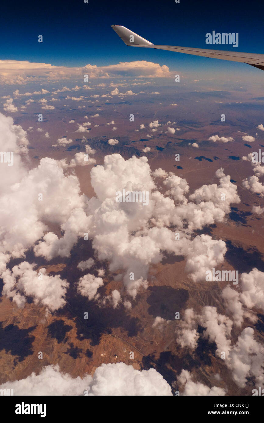 View of airplane flying over clouds hi-res stock photography and images ...