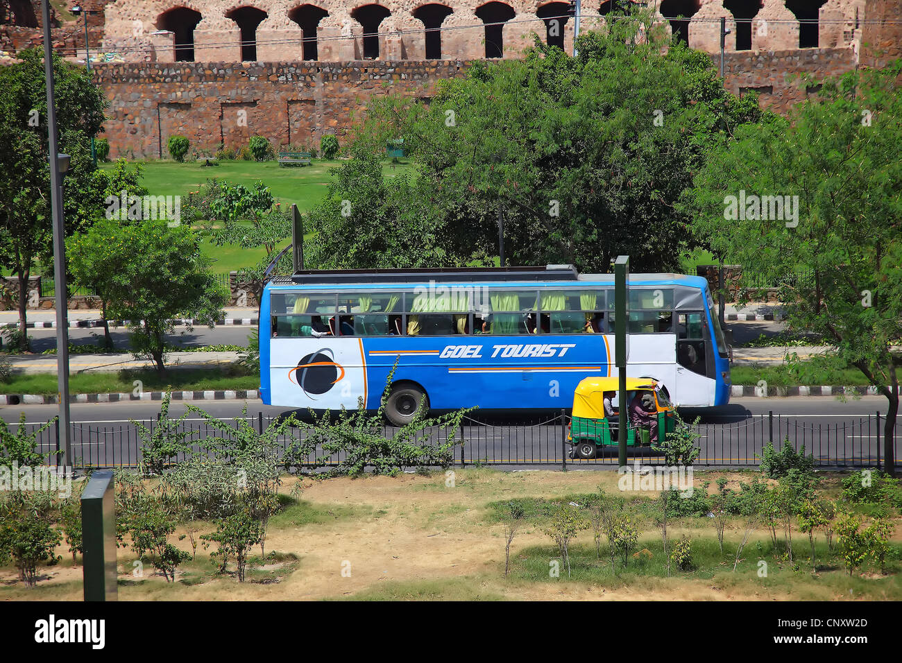 Bus and auto on highway Stock Photo - Alamy