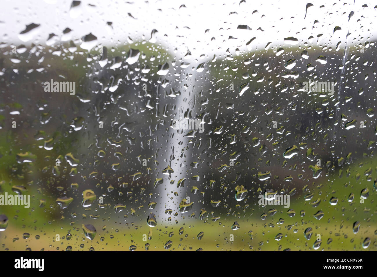 raindrops on window, Seljalandsfoss waterfall in background, Iceland ...