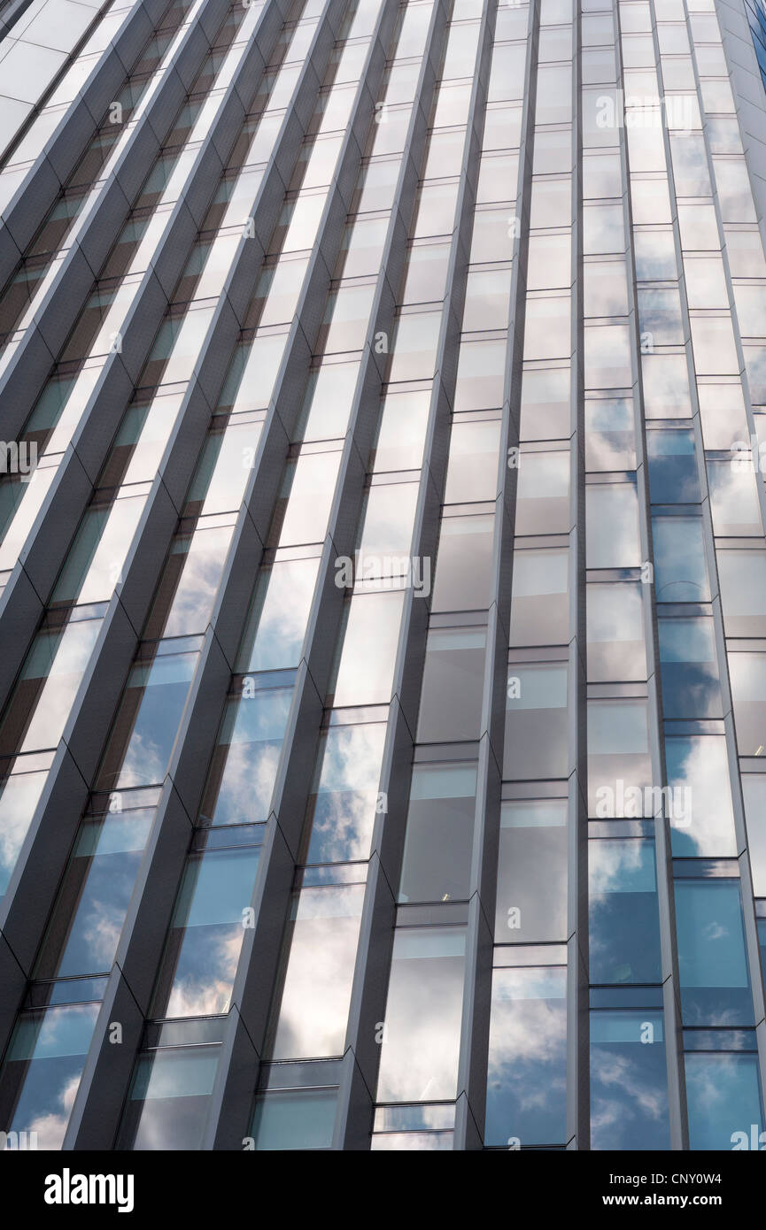 City of London glass fronted office block offices with reflection of ...
