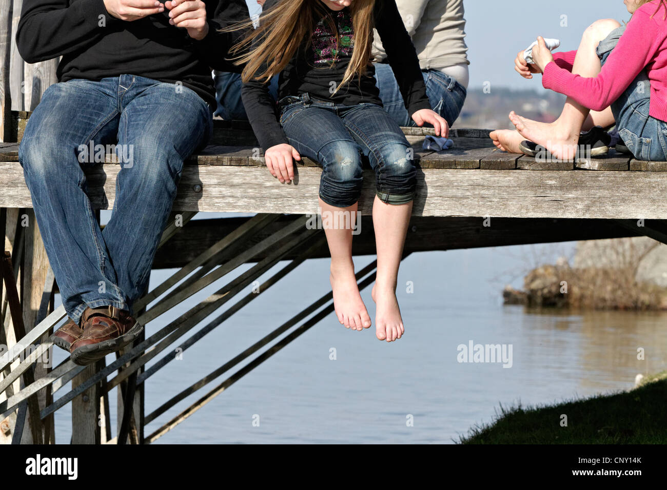 People legs dangling over edge hi-res stock photography and images - Alamy