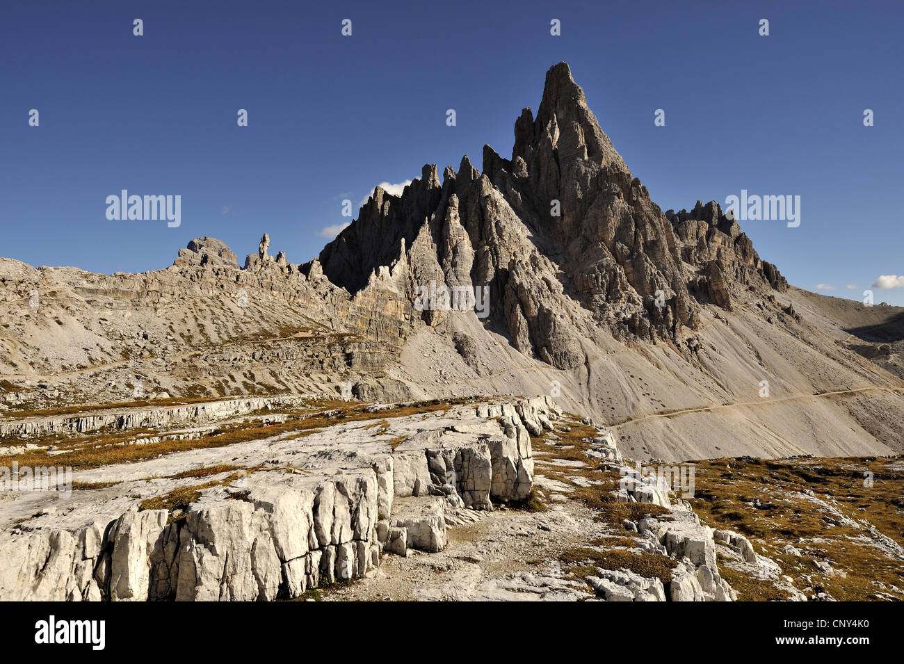 limestone pavements below the jagged peak of Monte Paterno, Italy ...