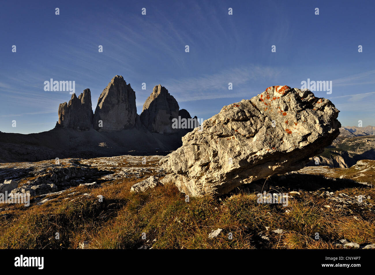 solitary boulder on a natural limestone pavement below the Tre Cime di ...