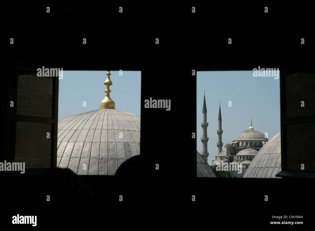 Blue Mosque seen through the windows of Hagia Sophia in Istanbul ...