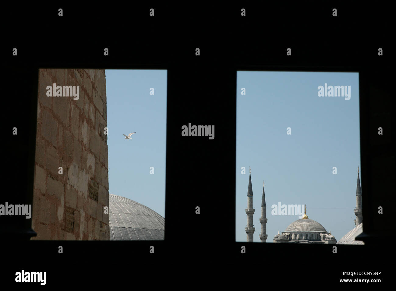 Blue Mosque seen through the windows of Hagia Sophia in Istanbul ...