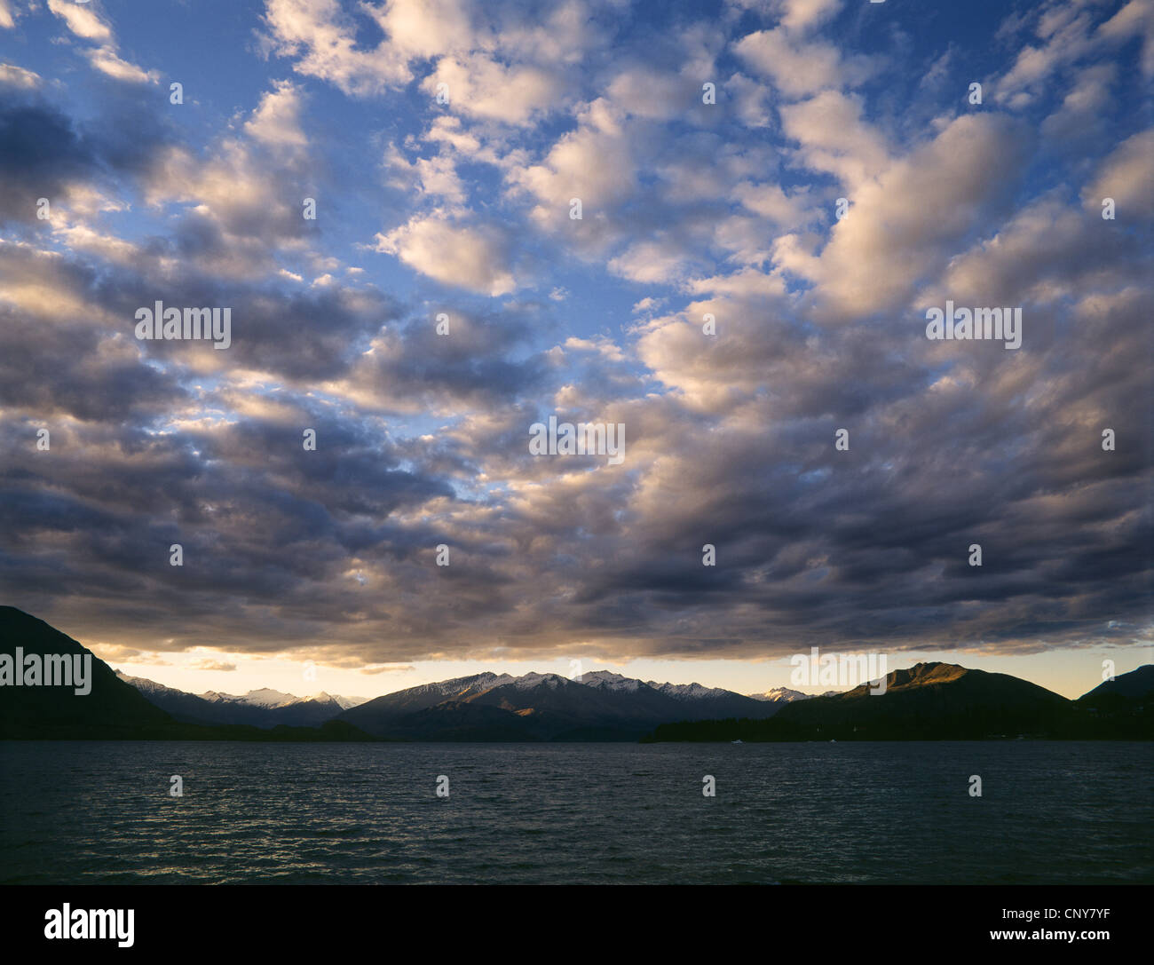 Early morning sky above Lake Wanaka and the Mt Alta range, South Island ...