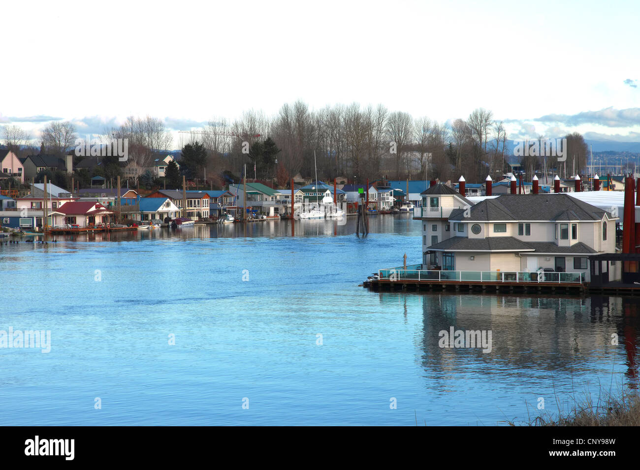 Urban living on a river Stock Photo - Alamy