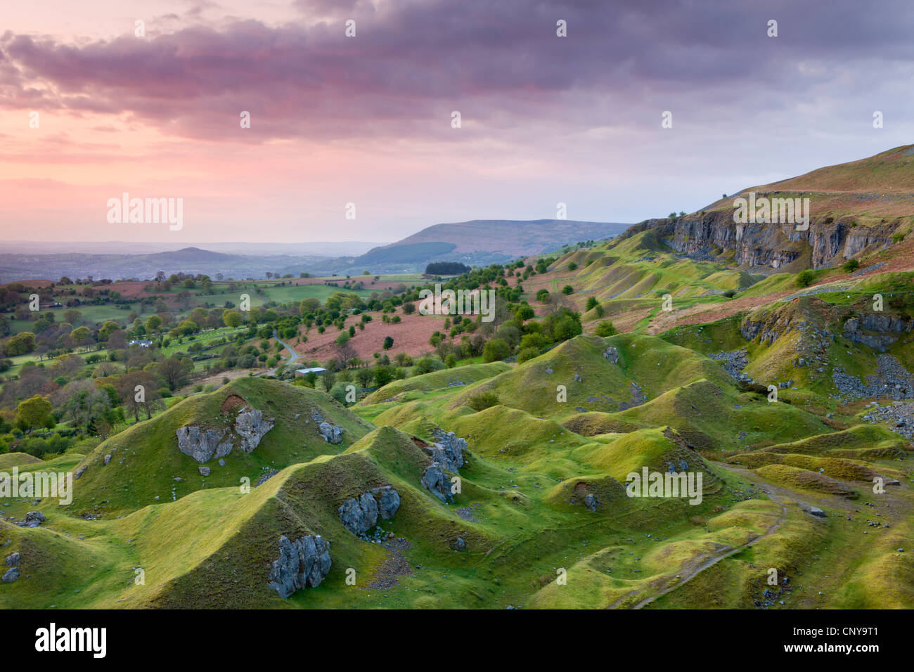 Sunrise over the abandoned quarry works on the Llangattock Escarpment ...