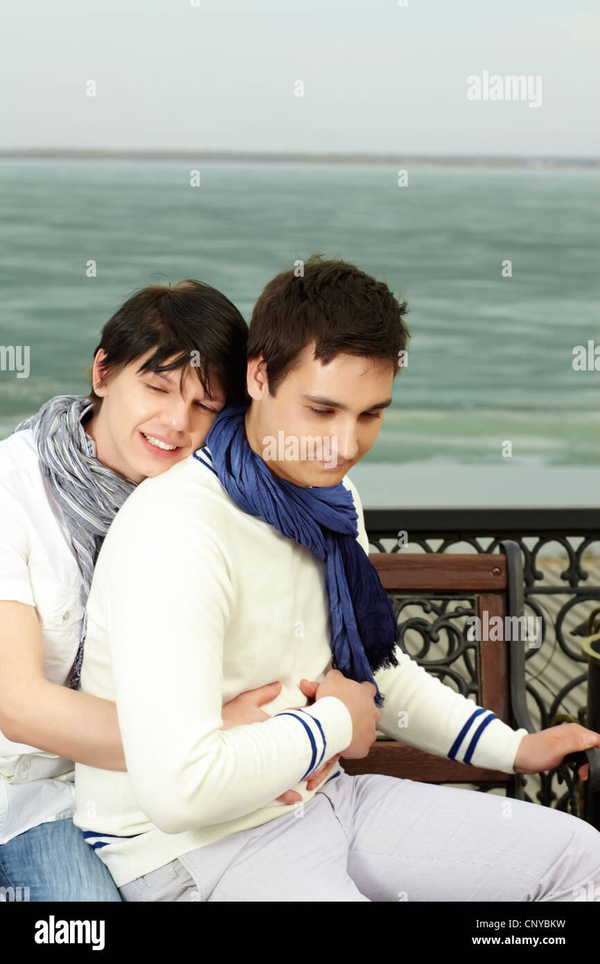 Young gay man hugging his lover smiling dreamily Stock Photo - Alamy Young gay man hugging his lover smiling dreamily Stock Photo - Alamy