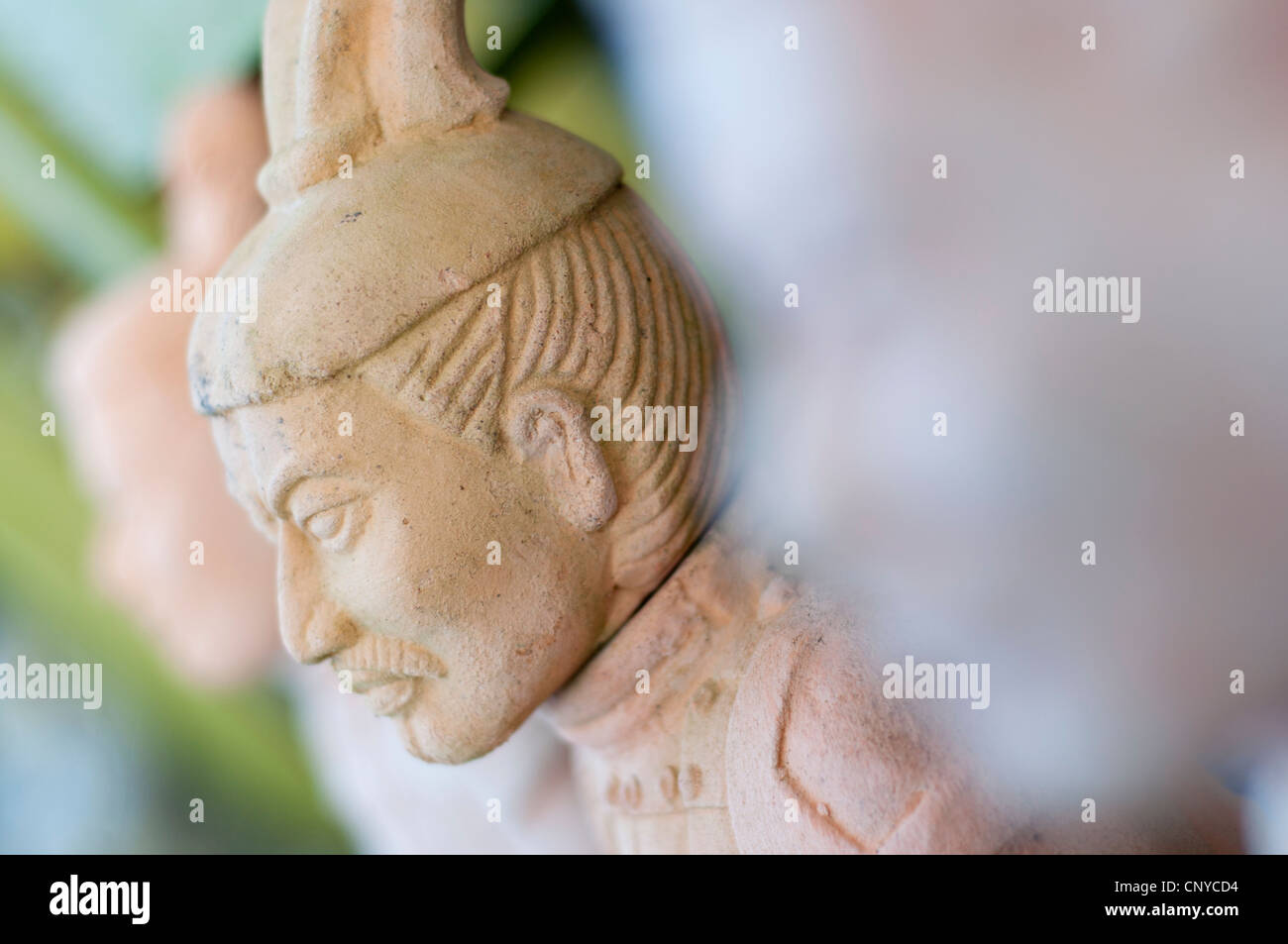 Eastern style garden ornament statue figure Stock Photo - Alamy