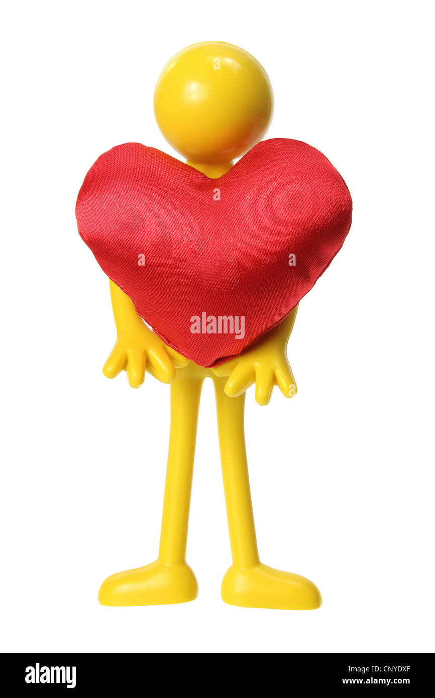 Miniature Rubber Figure with Love Heart Stock Photo - Alamy