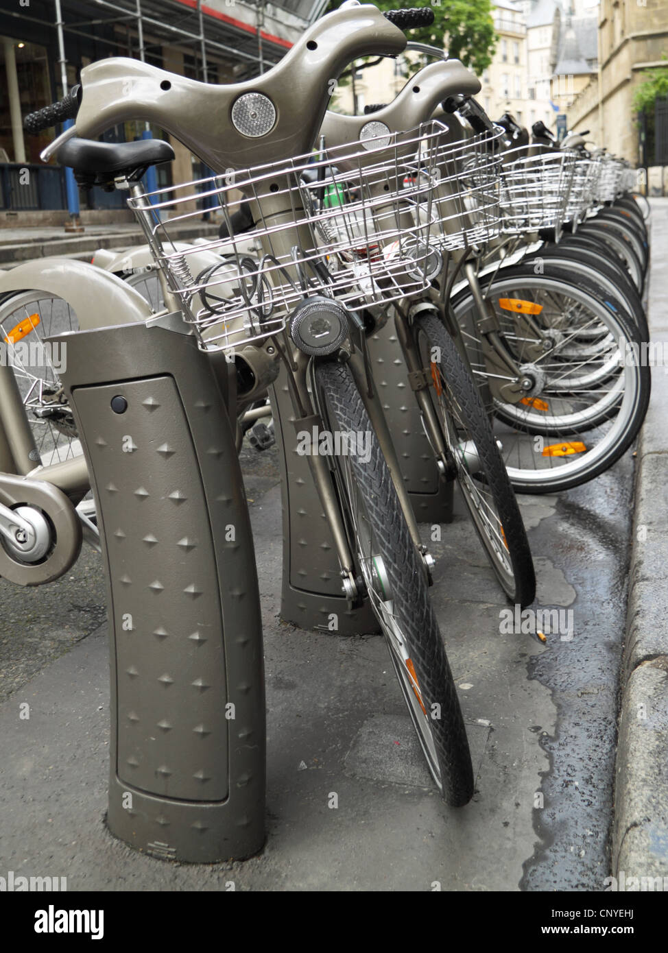Bicycles for rent at one of the many bike stations in Paris, part of ...