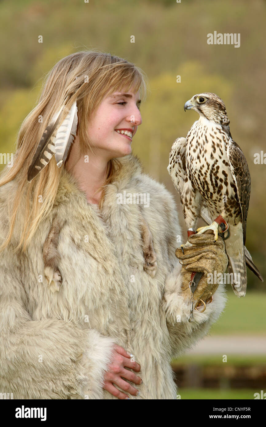Falcon on human hand hi-res stock photography and images - Alamy