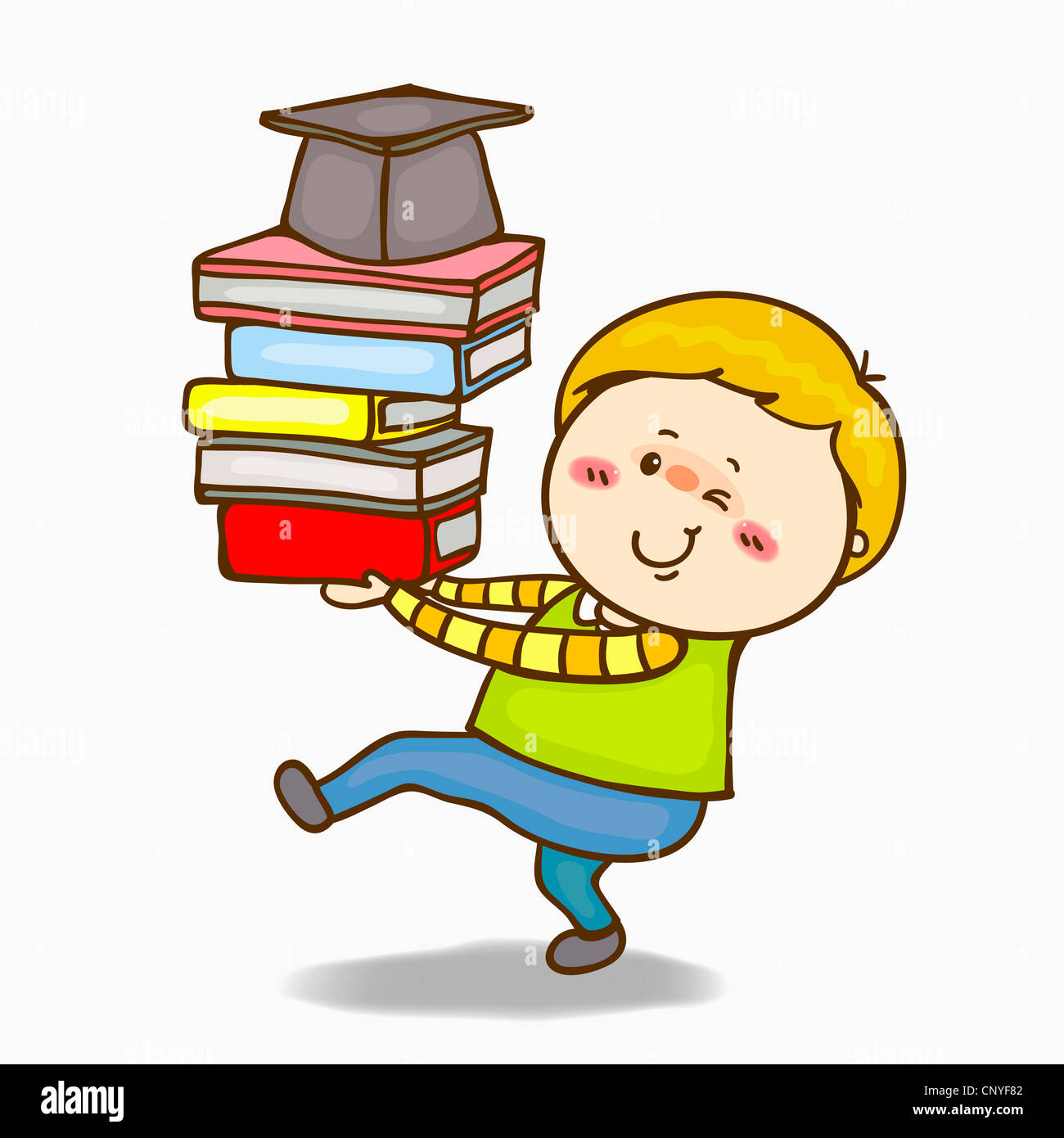 A boy carrying the book and graduation cap Stock Photo - Alamy