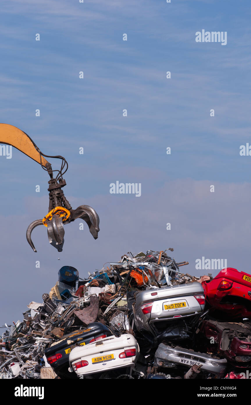 Scrap cars and metal at scrapyard recycler Stock Photo - Alamy