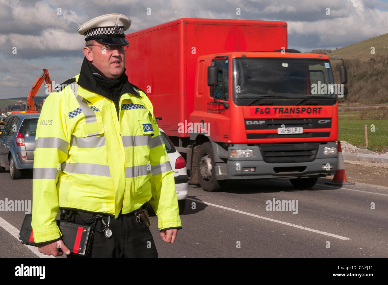 Policeman operating speed radar hi-res stock photography and images - Alamy