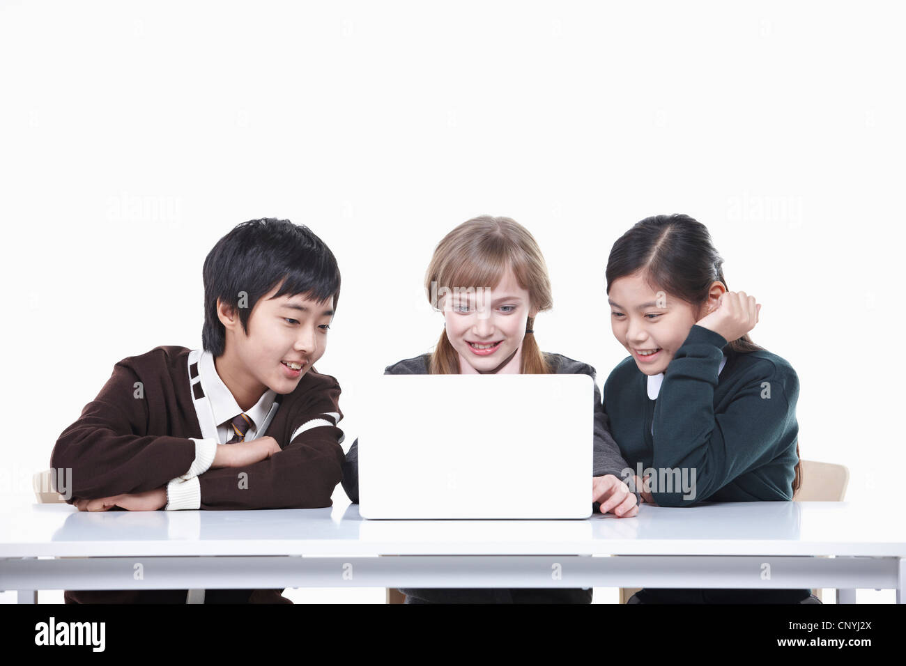 The global students looking at the laptop Stock Photo - Alamy