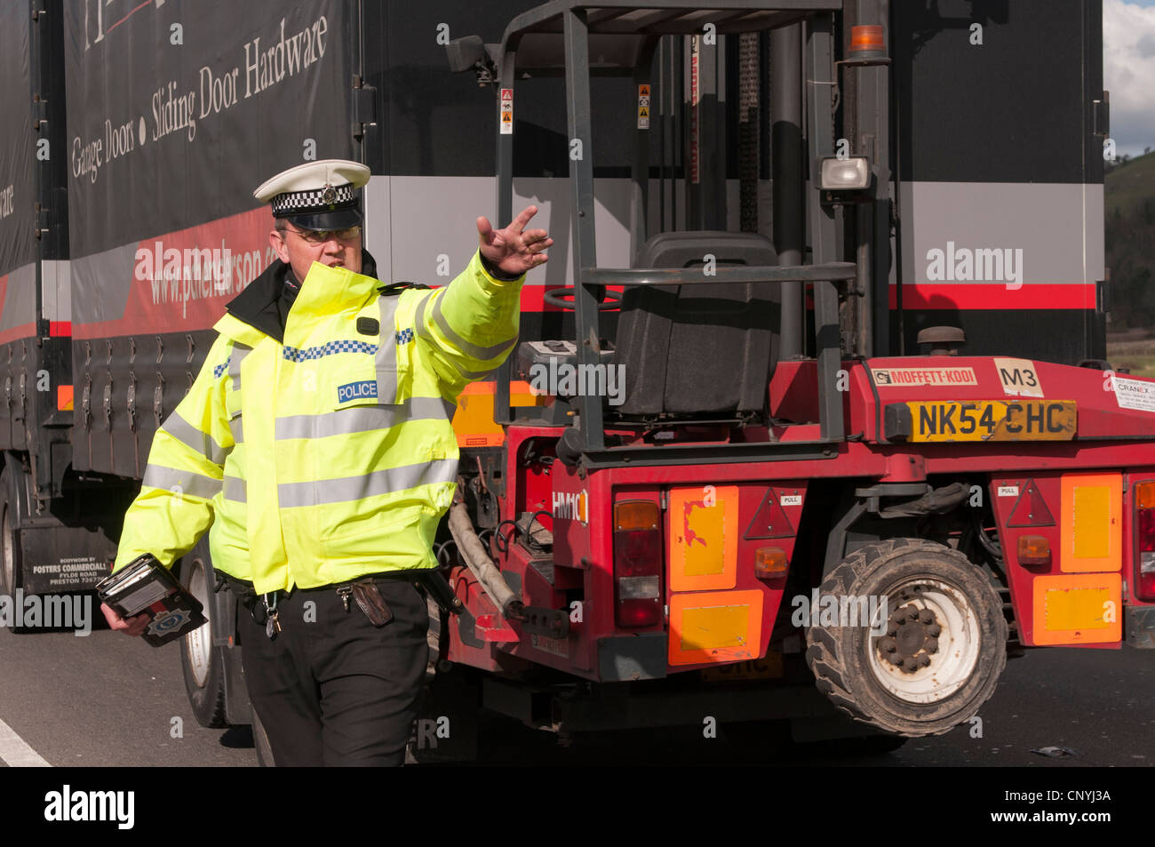 Traffic police officers operating a speed trap Stock Photo - Alamy